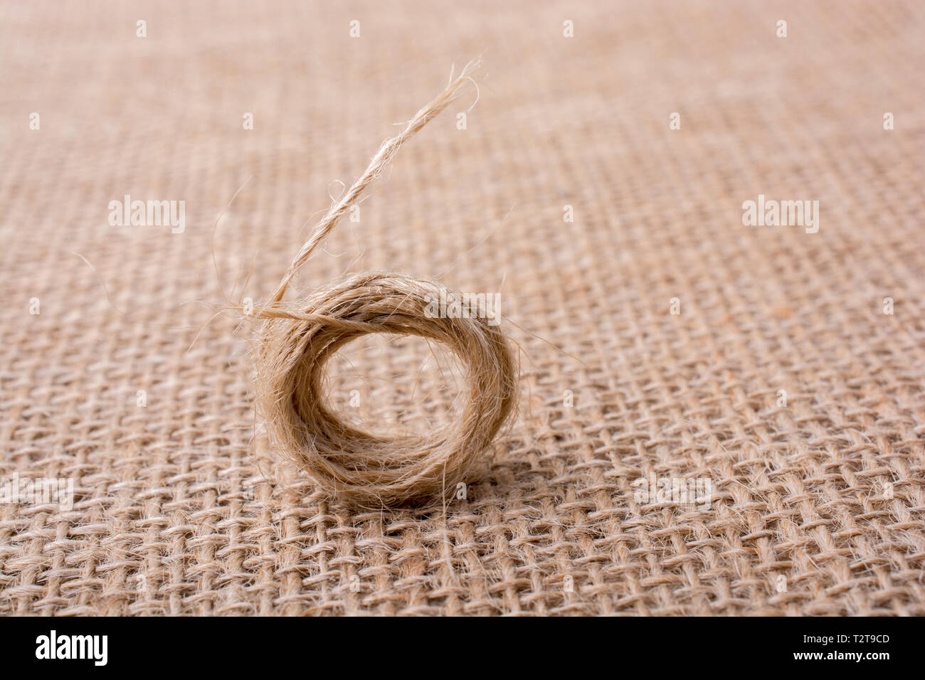Roll of brown color linen string paper background Stock Photo - Alamy