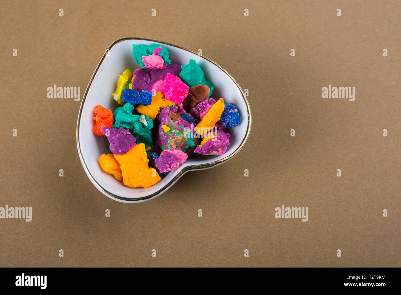 Dry colorful play dough in smal pieces Stock Photo - Alamy