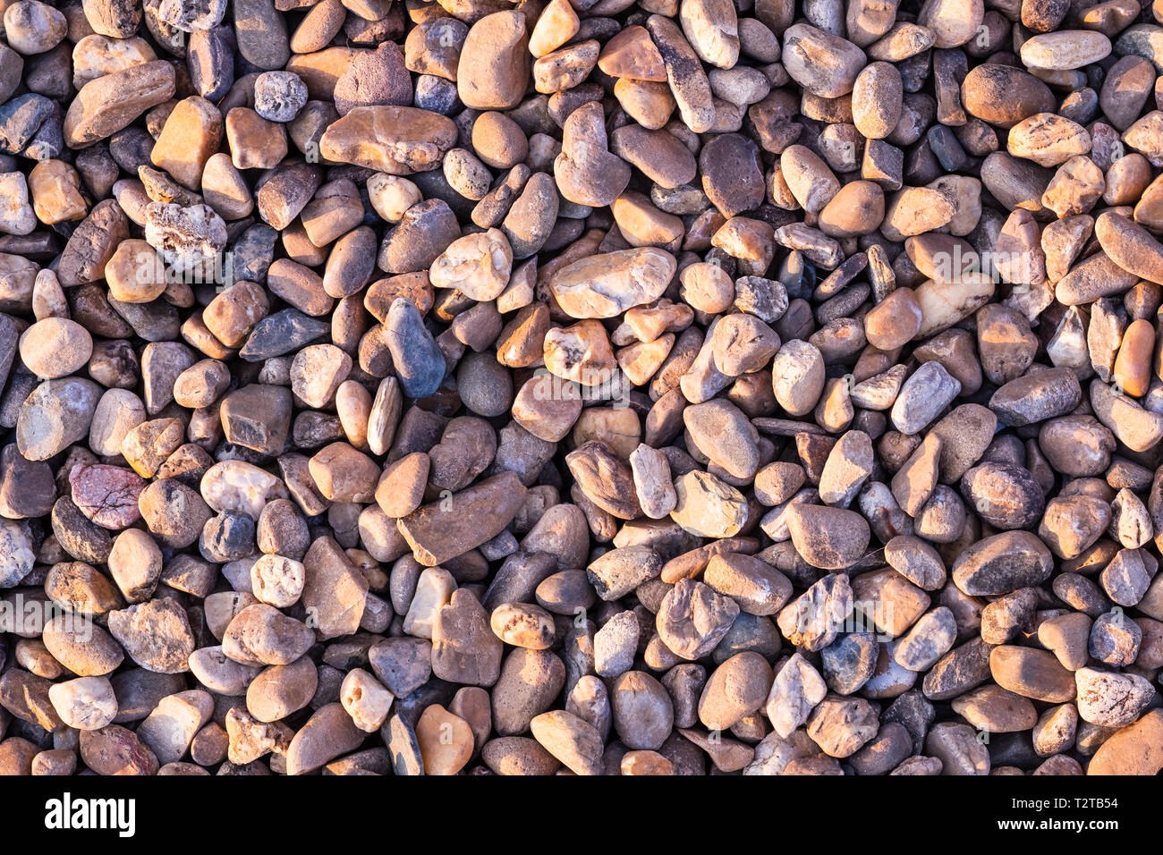 Rounded stone on the floor, good background and wallpaper , texture ...
