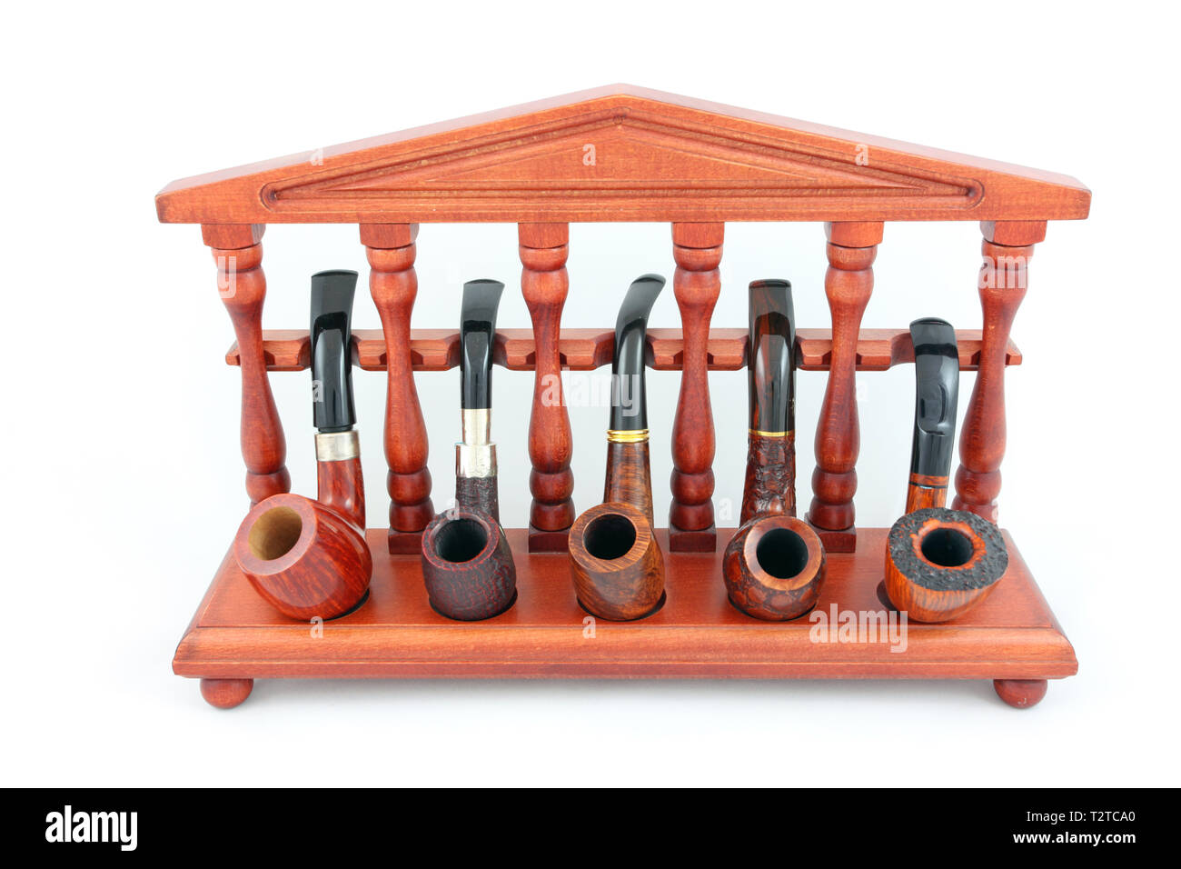 collection of smoking pipes on wooden stand Stock Photo - Alamy