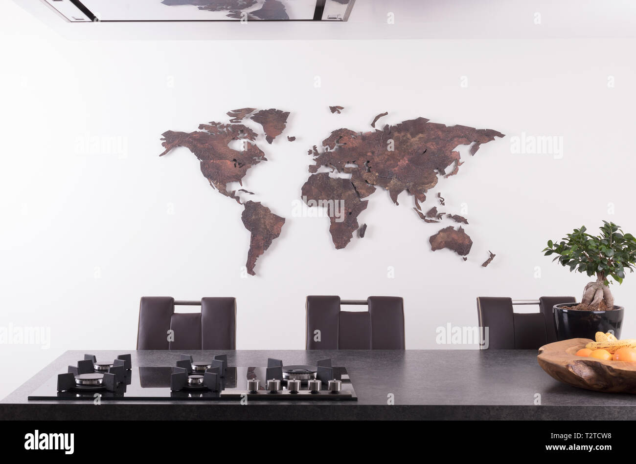 Roughly outlined world map on a kitchen wall Stock Photo - Alamy