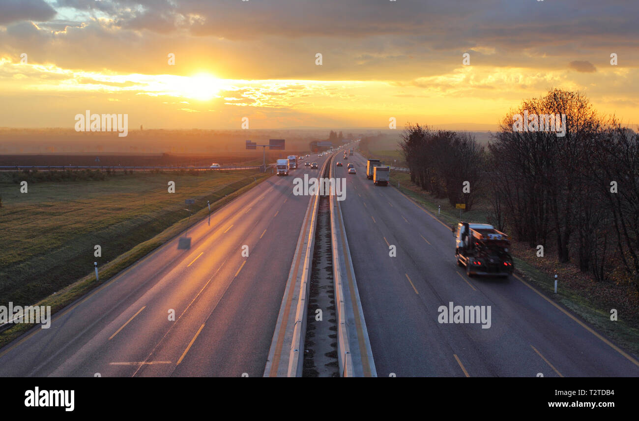 Cars drive on asphalt highway hi-res stock photography and images - Alamy