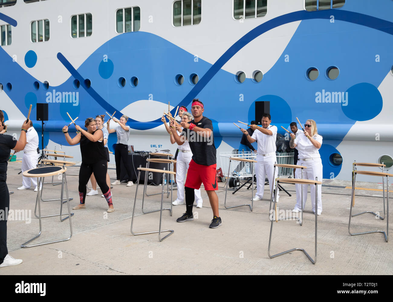 Crew of Aida Perla making music in Antigua alongside the ship Stock ...