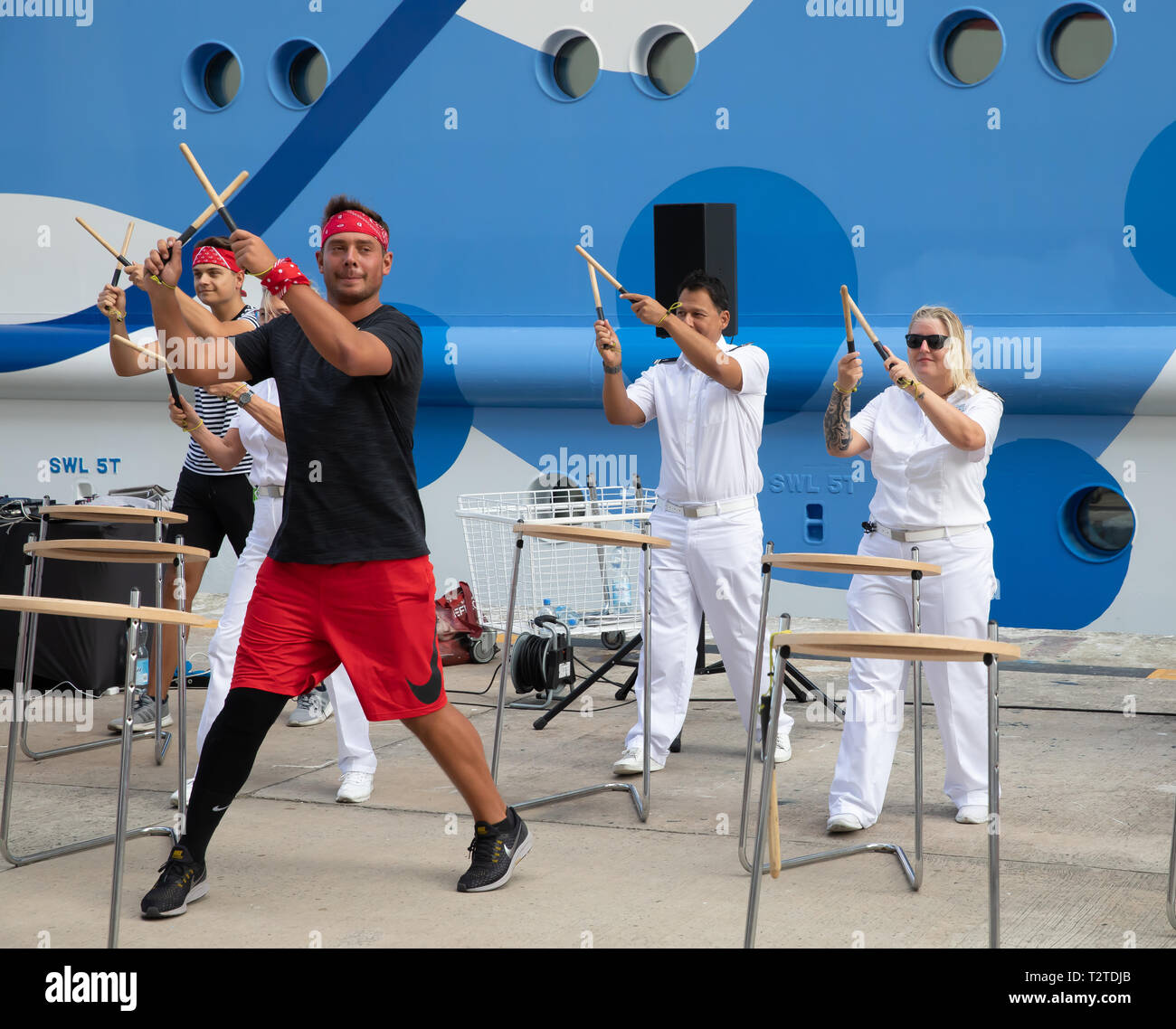 Crew of Aida Perla making music in Antigua alongside the ship Stock ...