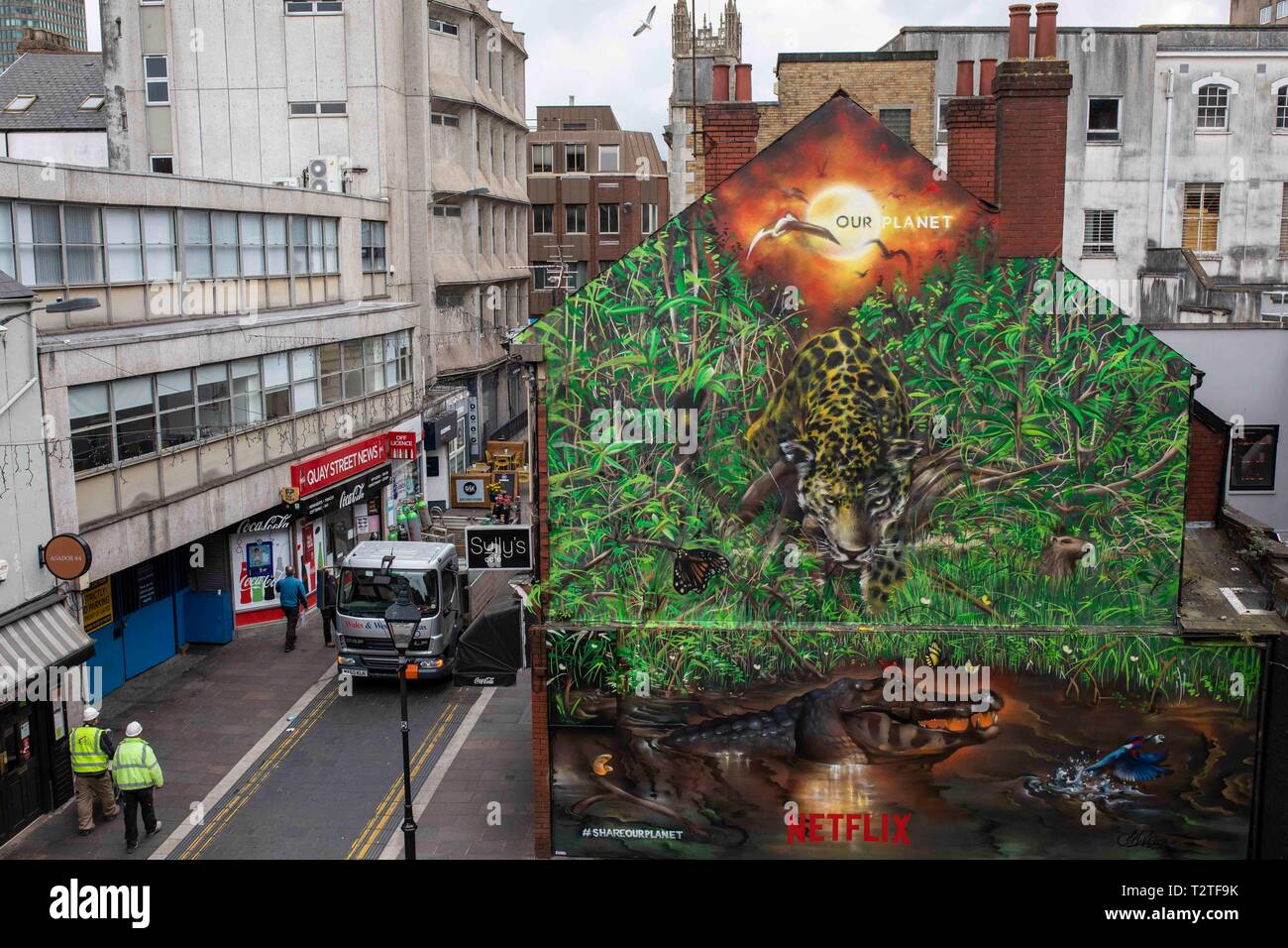 A promotional mural advertising Netflix show 'Our Planet' in Cardiff ...