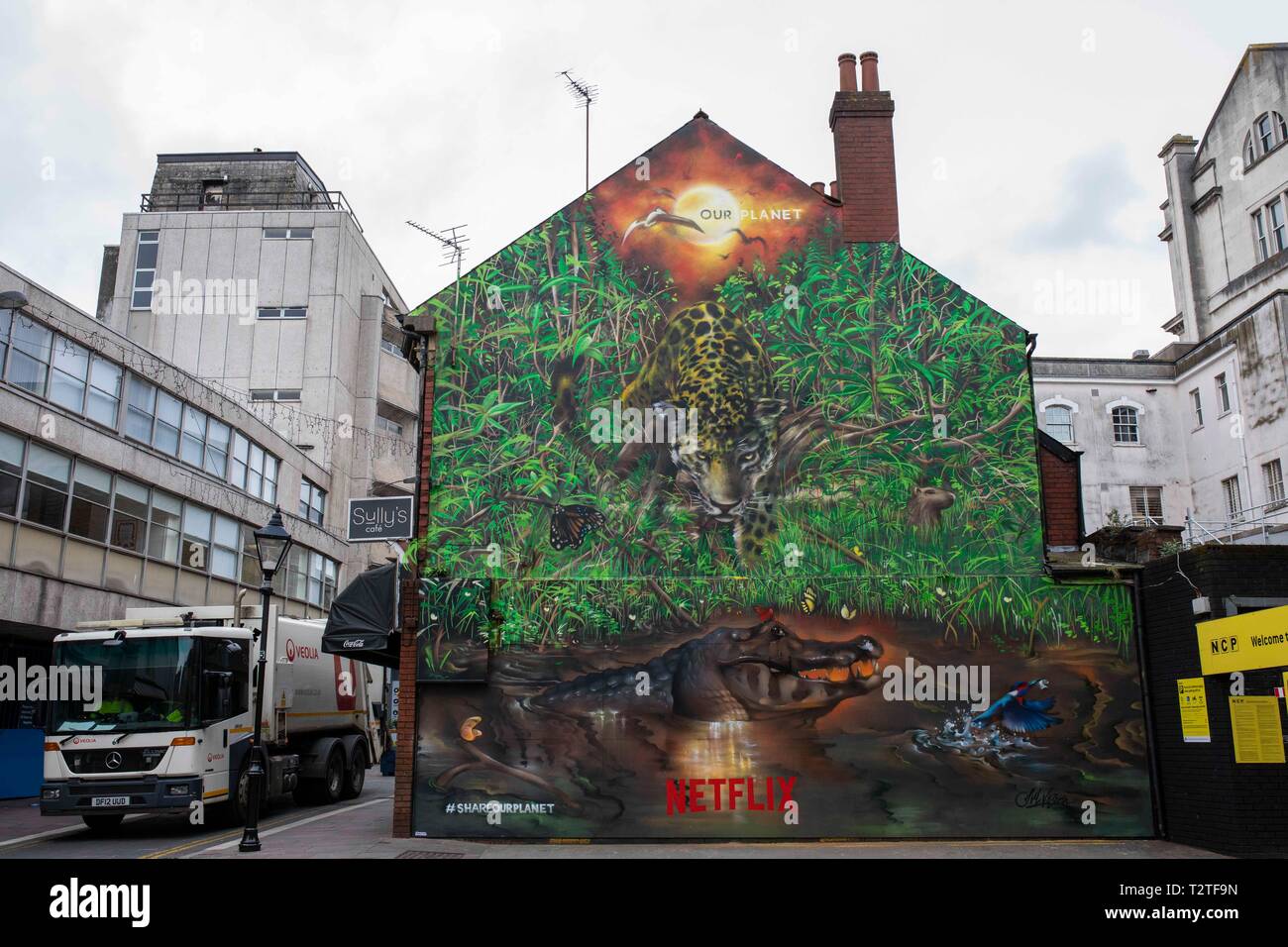 A promotional mural advertising Netflix show 'Our Planet' in Cardiff ...