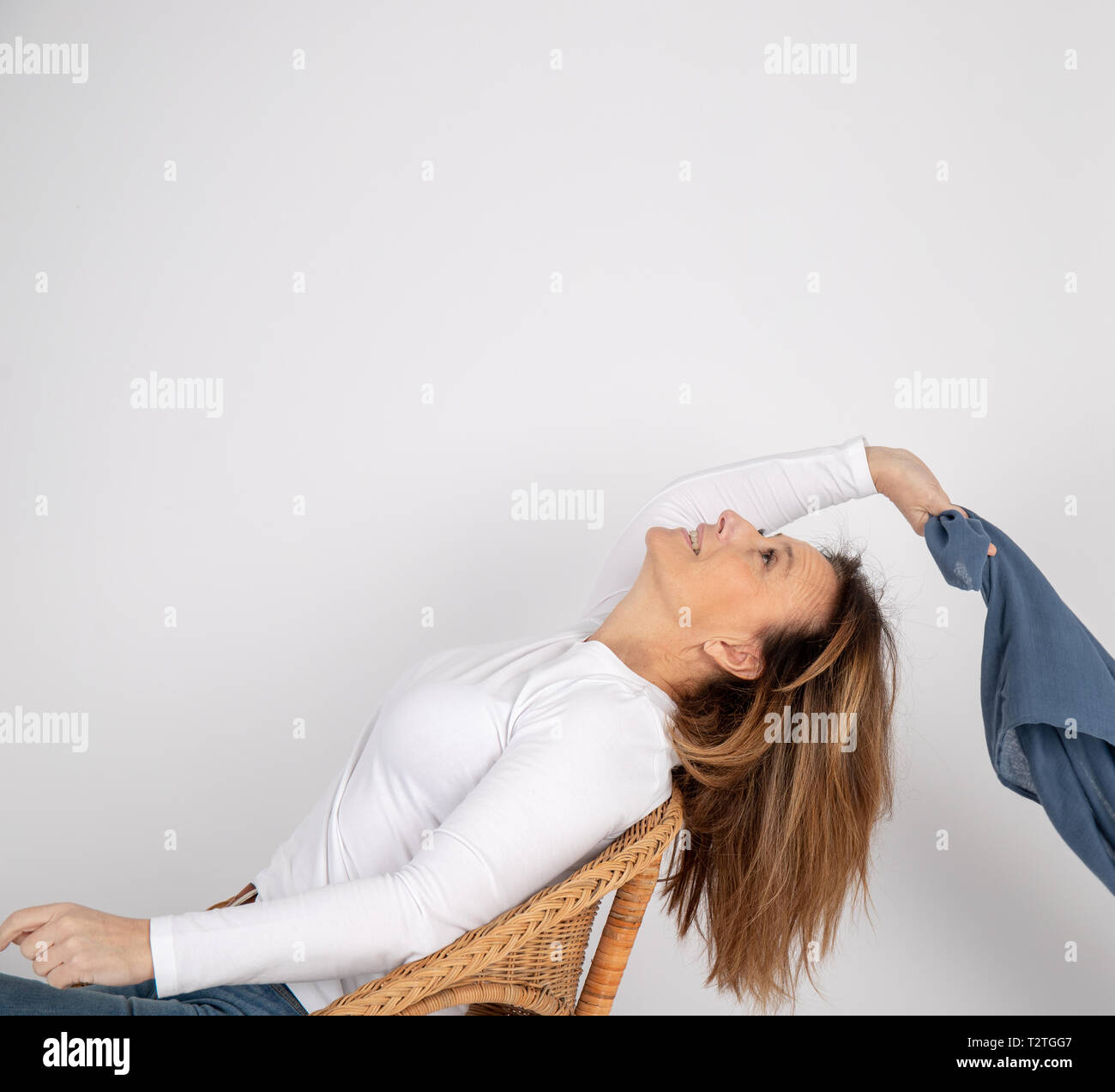 Old woman throws hi-res stock photography and images - Alamy