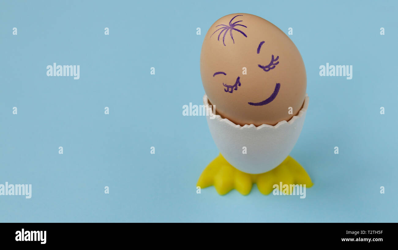 White chicken egg sleeping with happy face on the blue background, Copy ...
