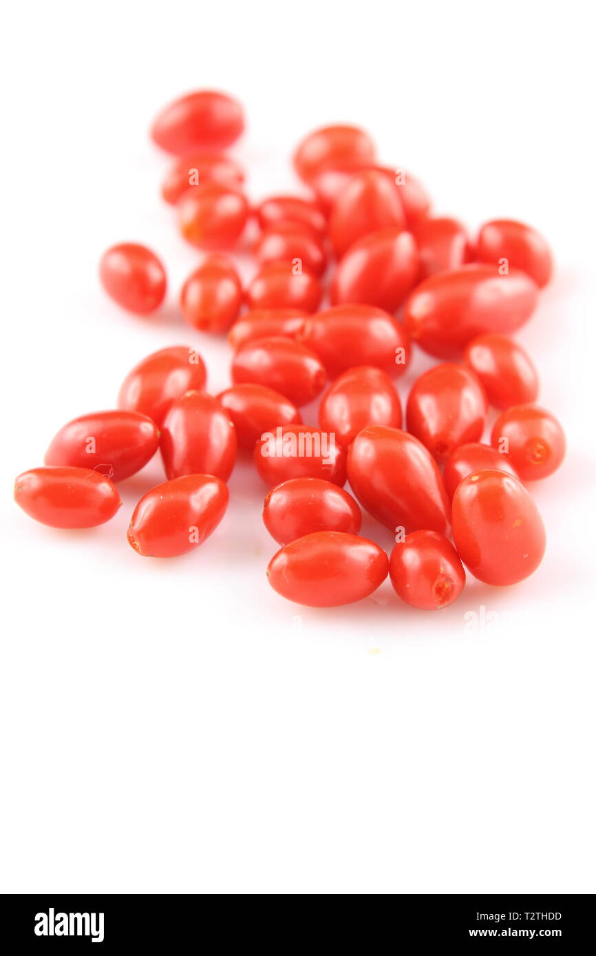 composition of fresh goji berries isolated on a white background with ...