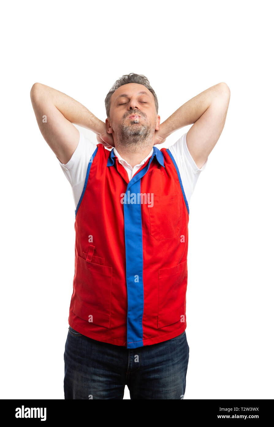 Tired supermarket or hypermarket male employee stretching with hands ...