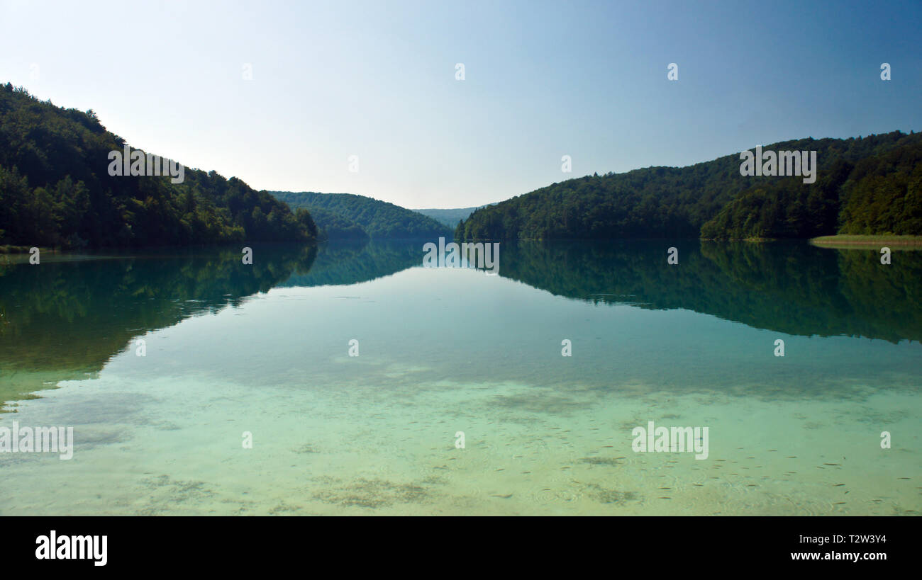 Crystal water and landscape with hills, Plitvice Lakes in Croatia Stock ...