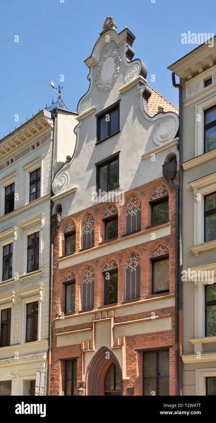 Fragment of old house in Torun. Poland Stock Photo - Alamy