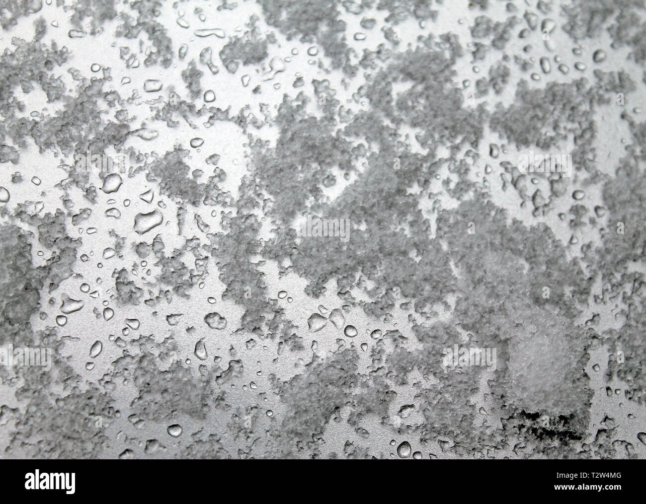 melting snow on the glass. sleet on glass. lace grey texture Stock ...