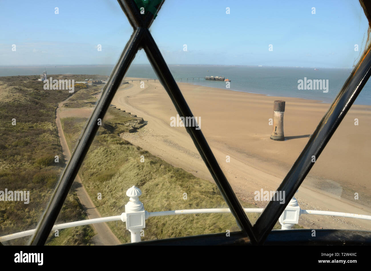 View of coastline and North Sea through window of lighthouse at Spurn ...