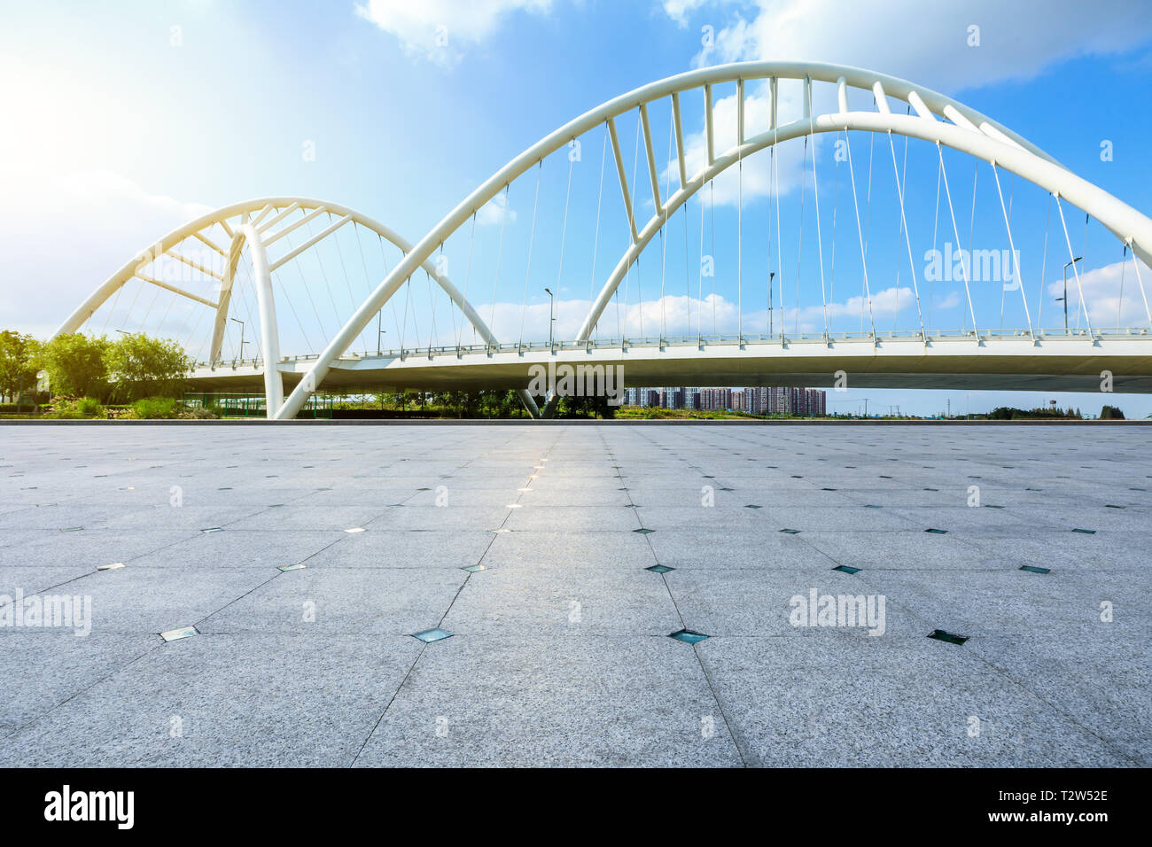 Empty square floor and bridge construction in shanghai Stock Photo - Alamy