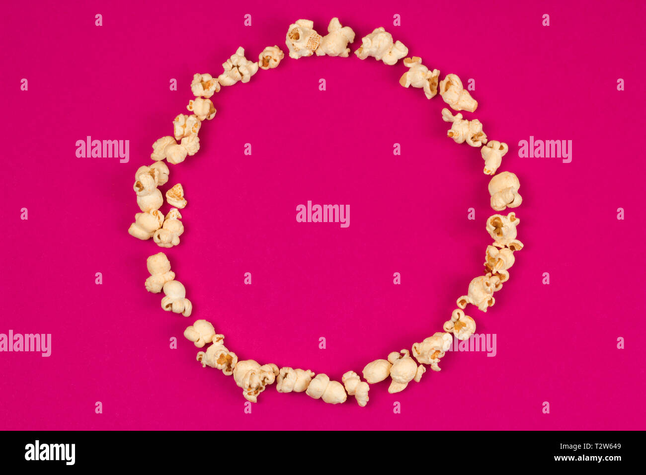 top view food fashion flat lay popcorn circle frame with copy space on a pink background Stock ...