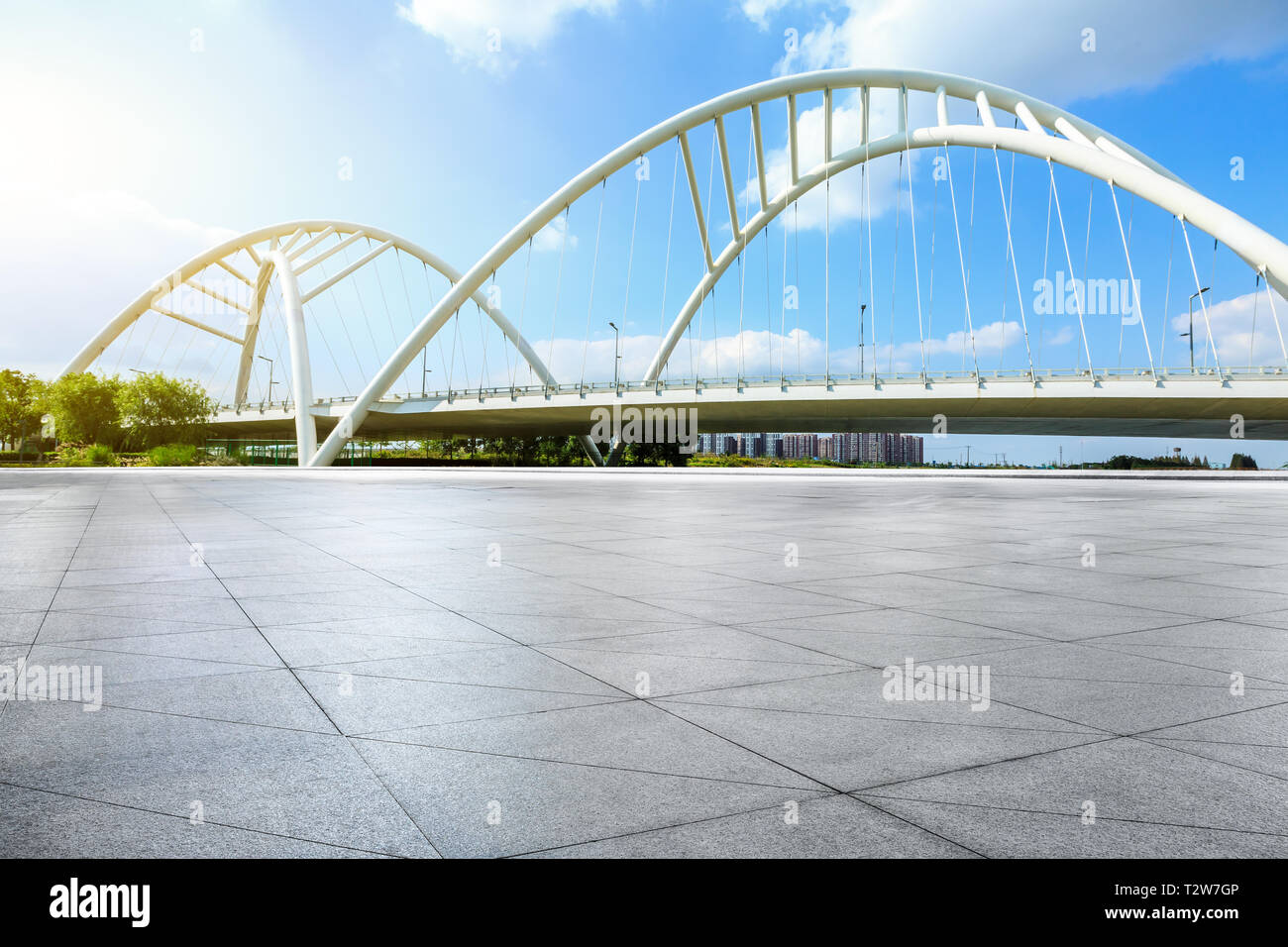 Empty square floor and bridge construction in shanghai Stock Photo - Alamy