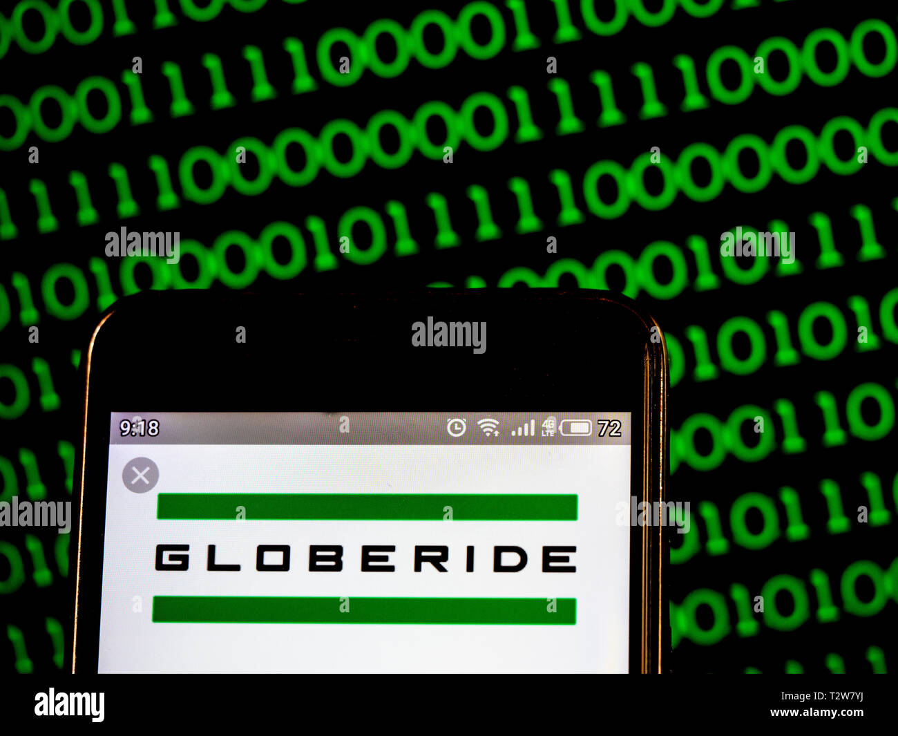 In this photo illustration a Globe ride, Inc. logo seen displayed on a ...