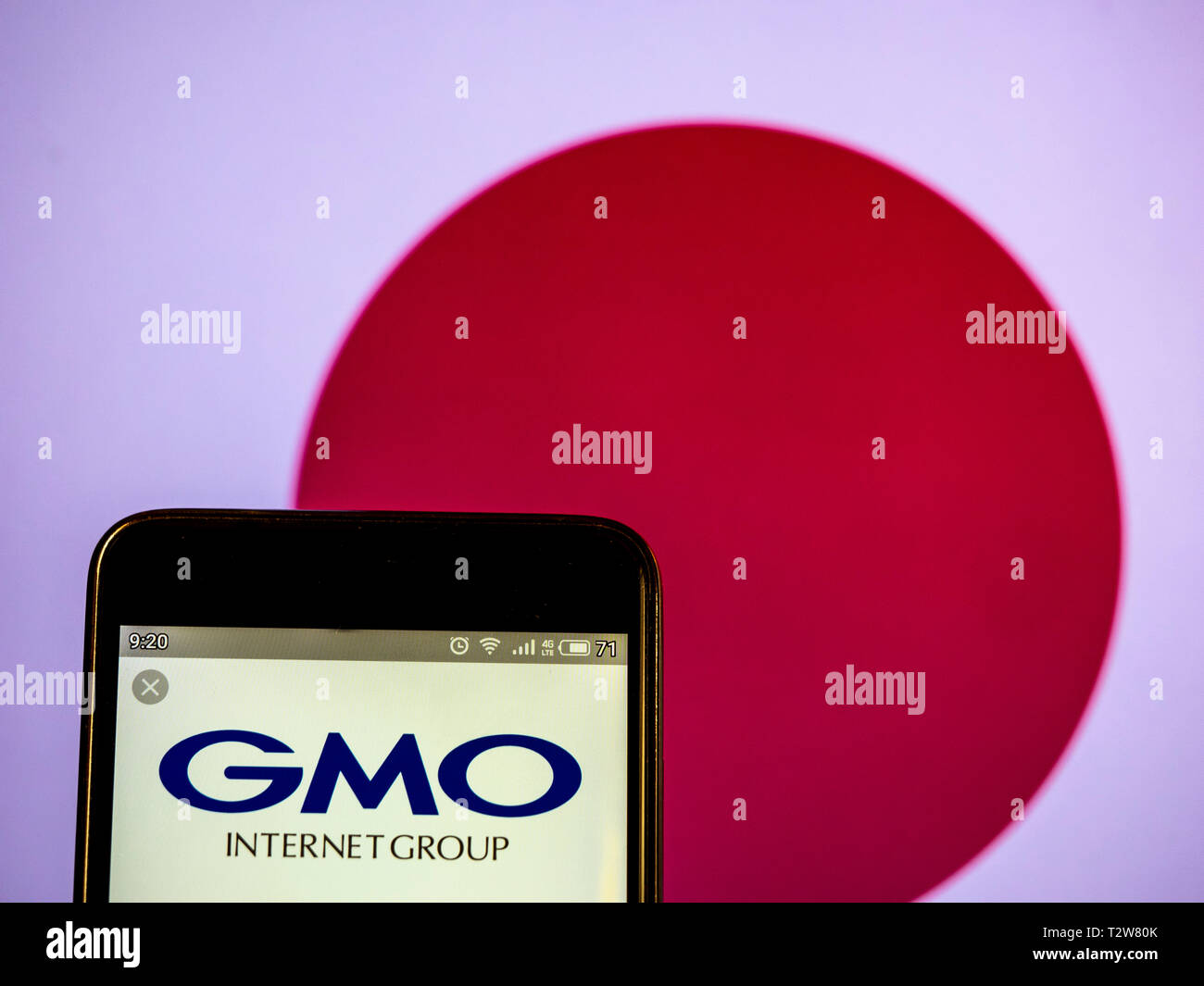 In this photo illustration a GMO Internet, Inc. logo seen displayed on ...
