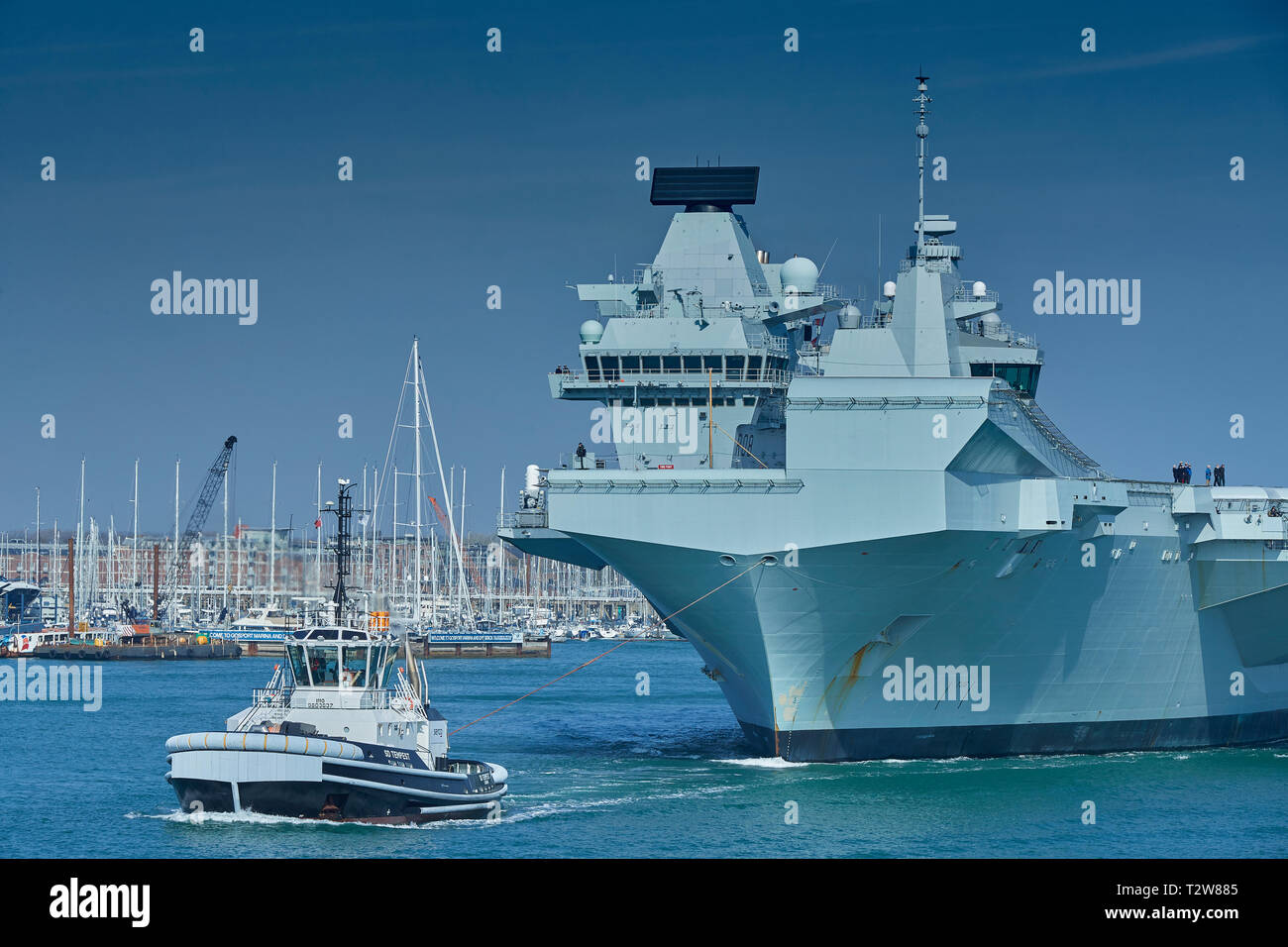 Royal Navy Aircraft Carrier, HMS QUEEN ELIZABETH, Being Assisted By Tug ...