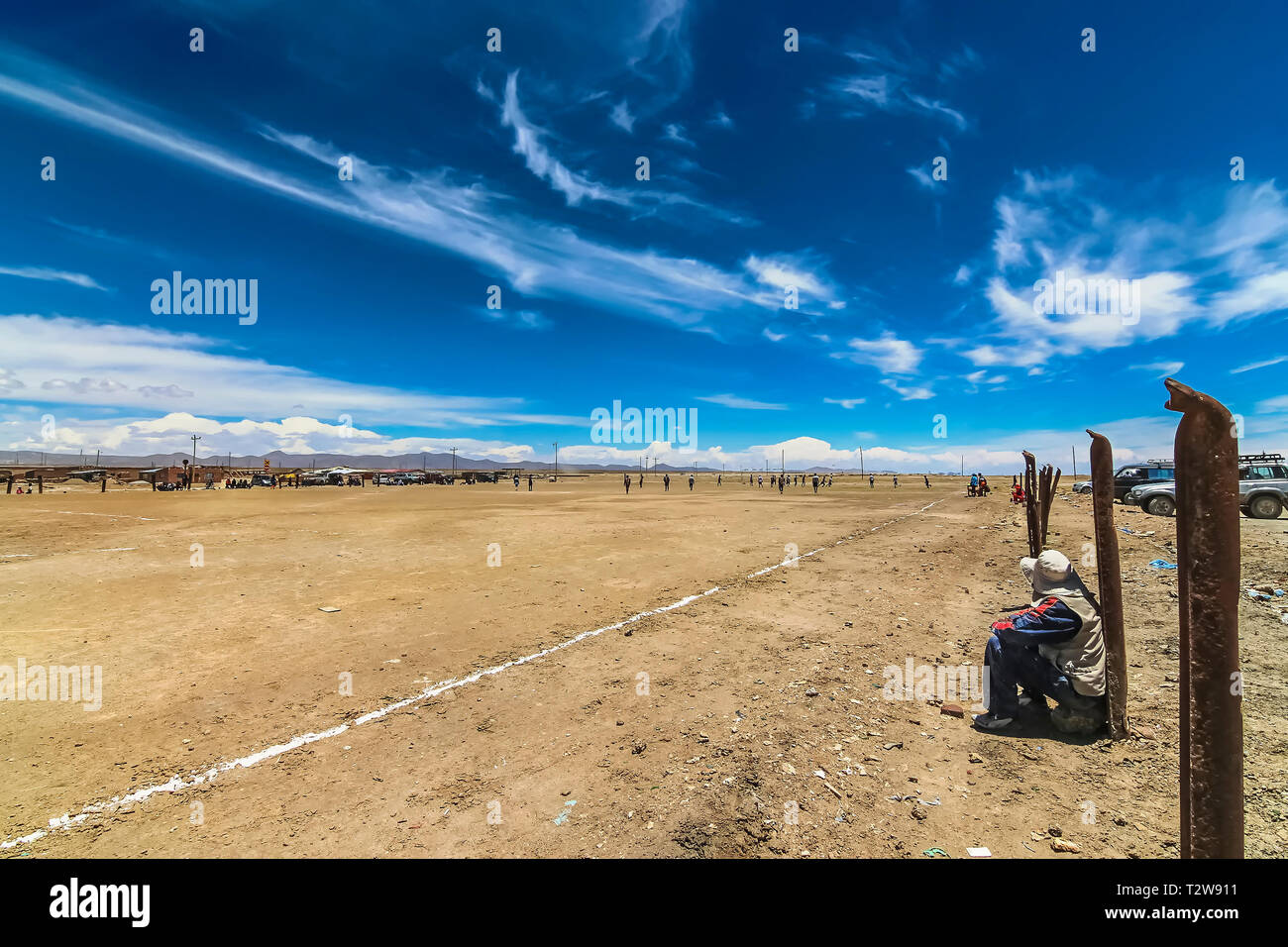 Colchani, Bolivia - Dec 2014: Spectators watching natives play football ...