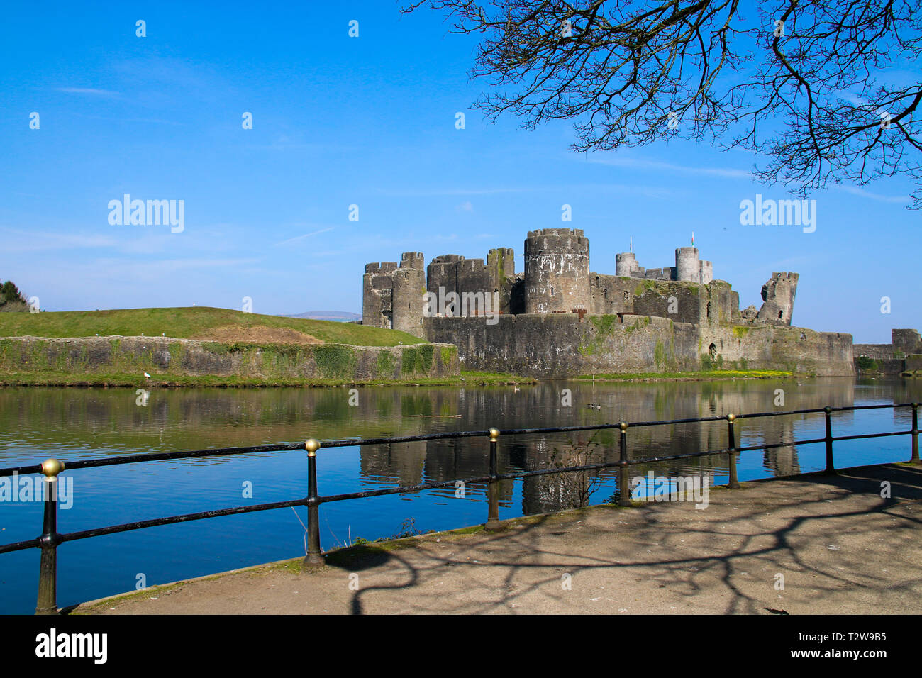 Caerphilly Castle, near Cardiff, South Wales, UK in the spring sunshine ...