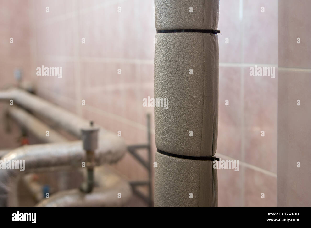 heat insulation of heating and cooling pipes Stock Photo - Alamy