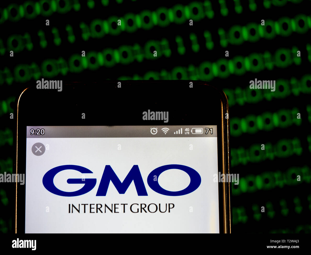In this photo illustration a GMO Internet, Inc. logo seen displayed on ...