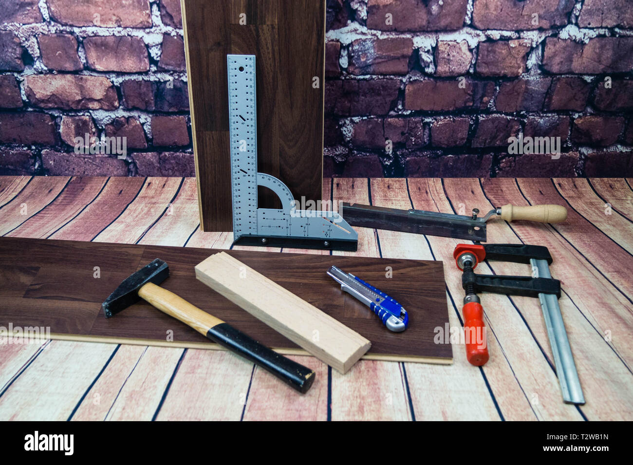 Tools for laying wooden Laminate or parquet on the floor Stock Photo ...