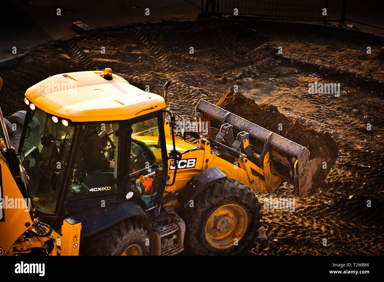 excavator at a construction site Stock Photo - Alamy