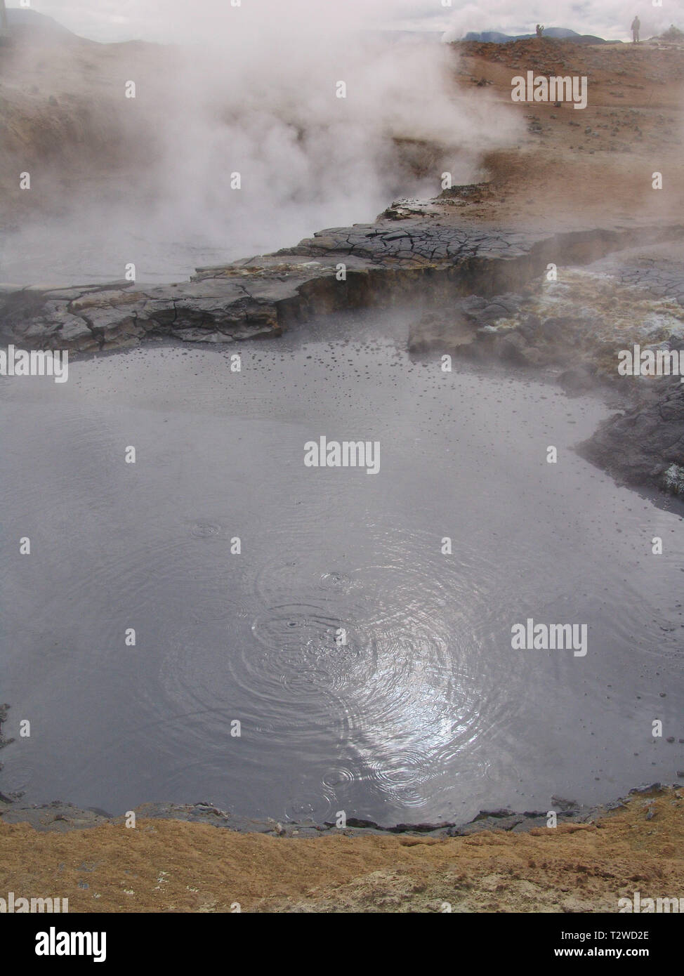 hot mud volcano on island Stock Photo - Alamy