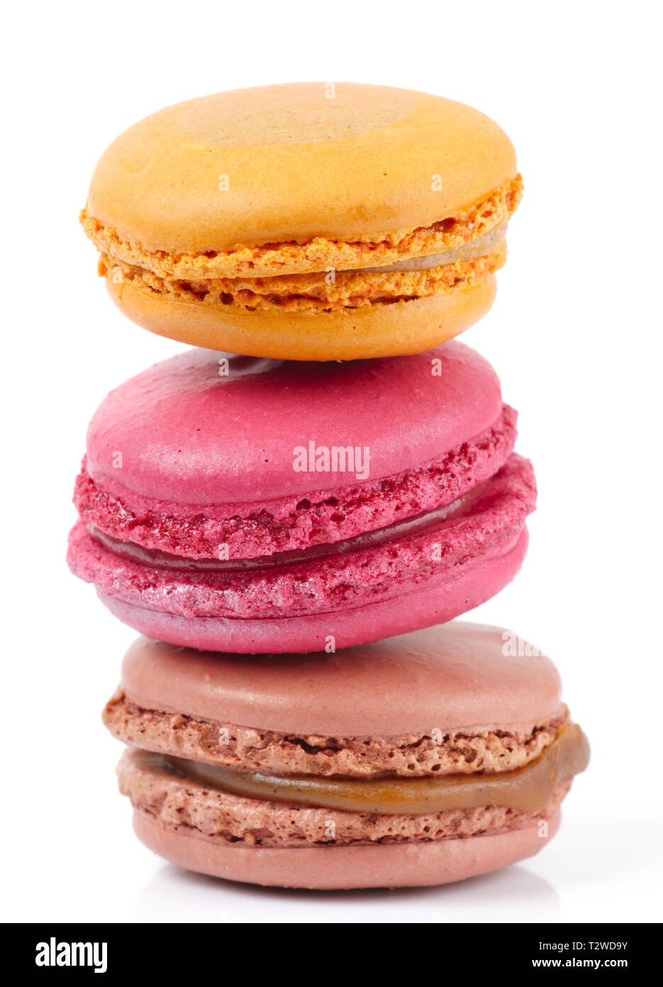 Three colorful macarons isolated on white background Stock Photo - Alamy