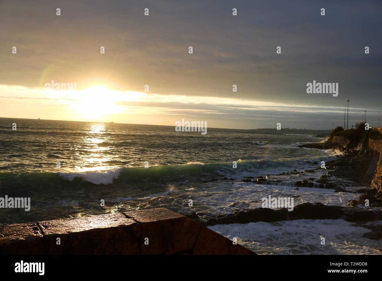Sunset on the beah Stock Photo - Alamy