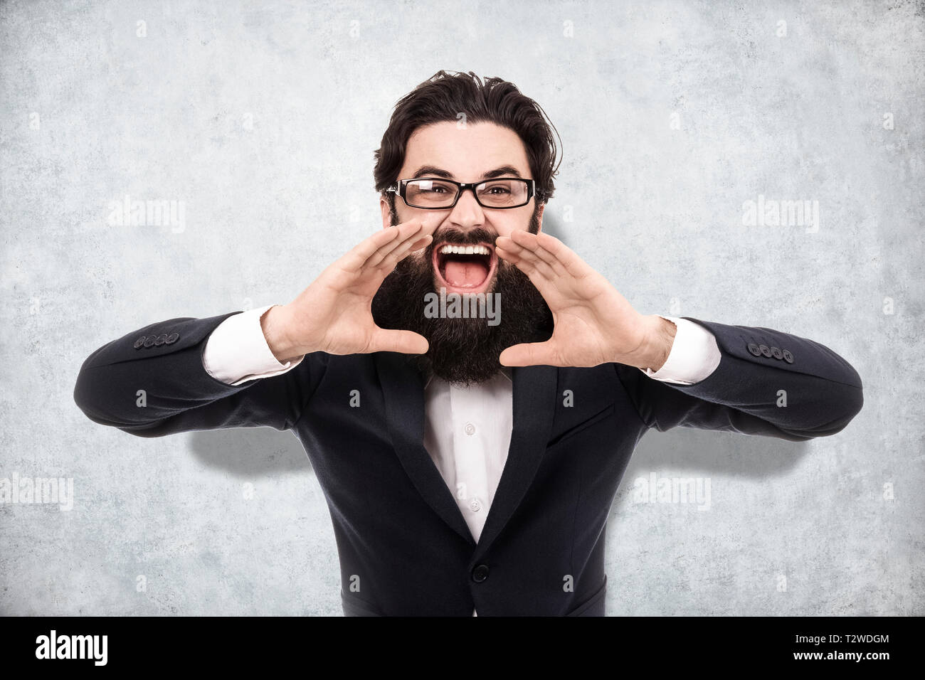 businessman shouting and holding hands near the mouth, image on the ...