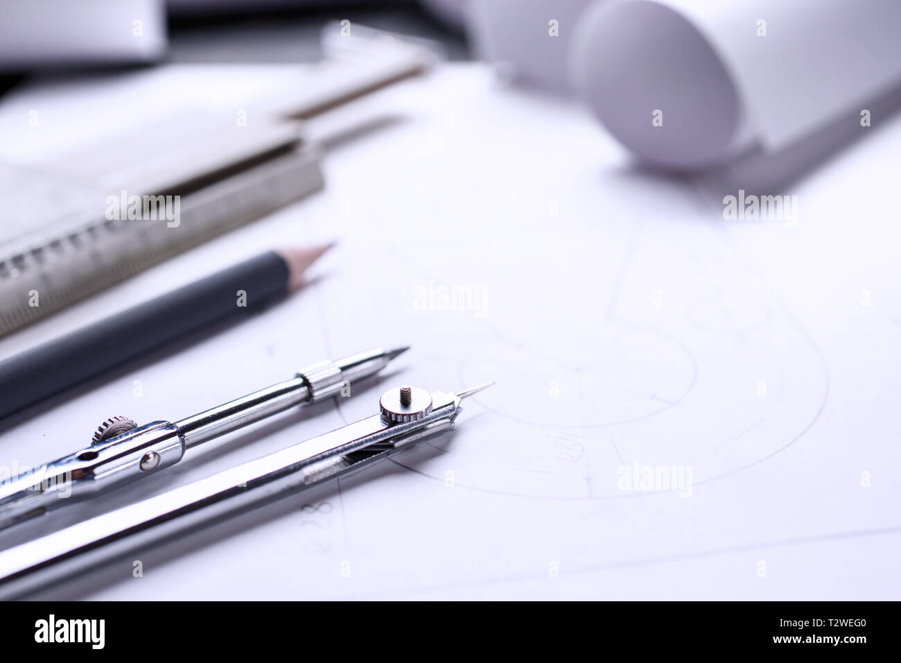 On the desk are tools for creating drawings. indastrial drawing detail ...