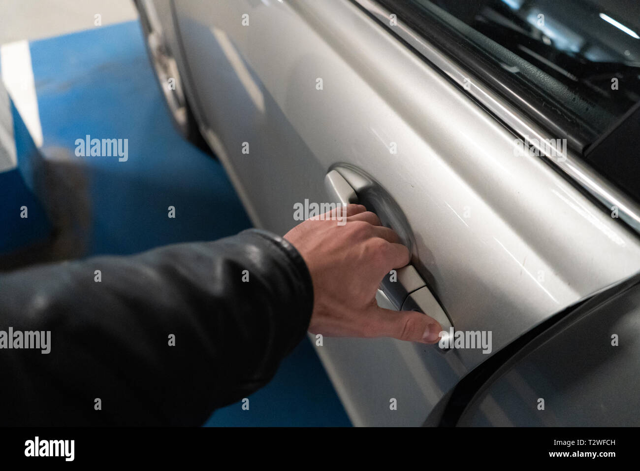 Doorman opening door hi-res stock photography and images - Alamy