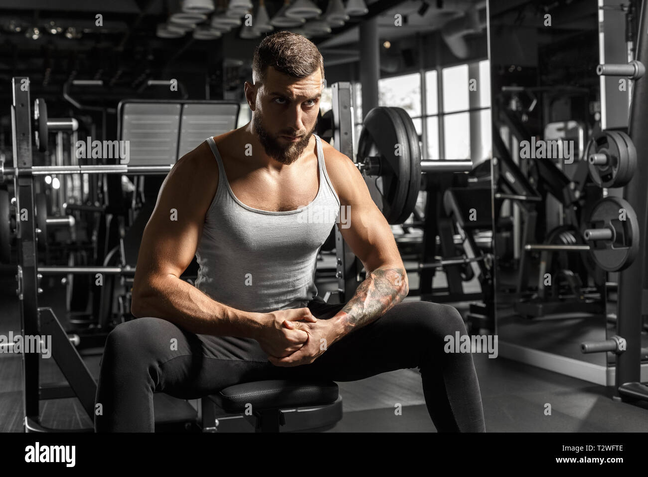 Handsome bodybuilder sitting on bench hi-res stock photography and ...