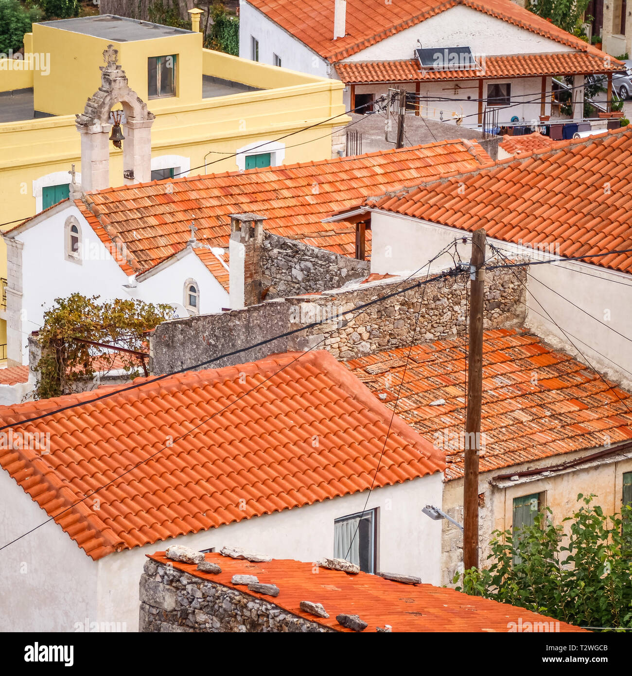Argiroupolis small mountain village in Crete. Greece. Red roofs and ...