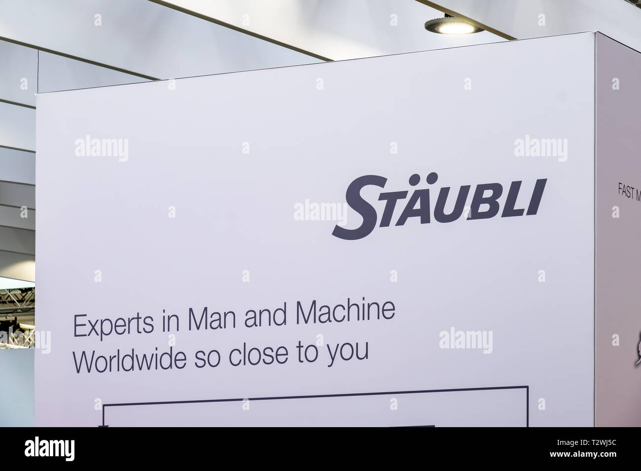 HANNOVER / GERMANY - APRIL 02 2019 : Staubli is presenting the newest ...