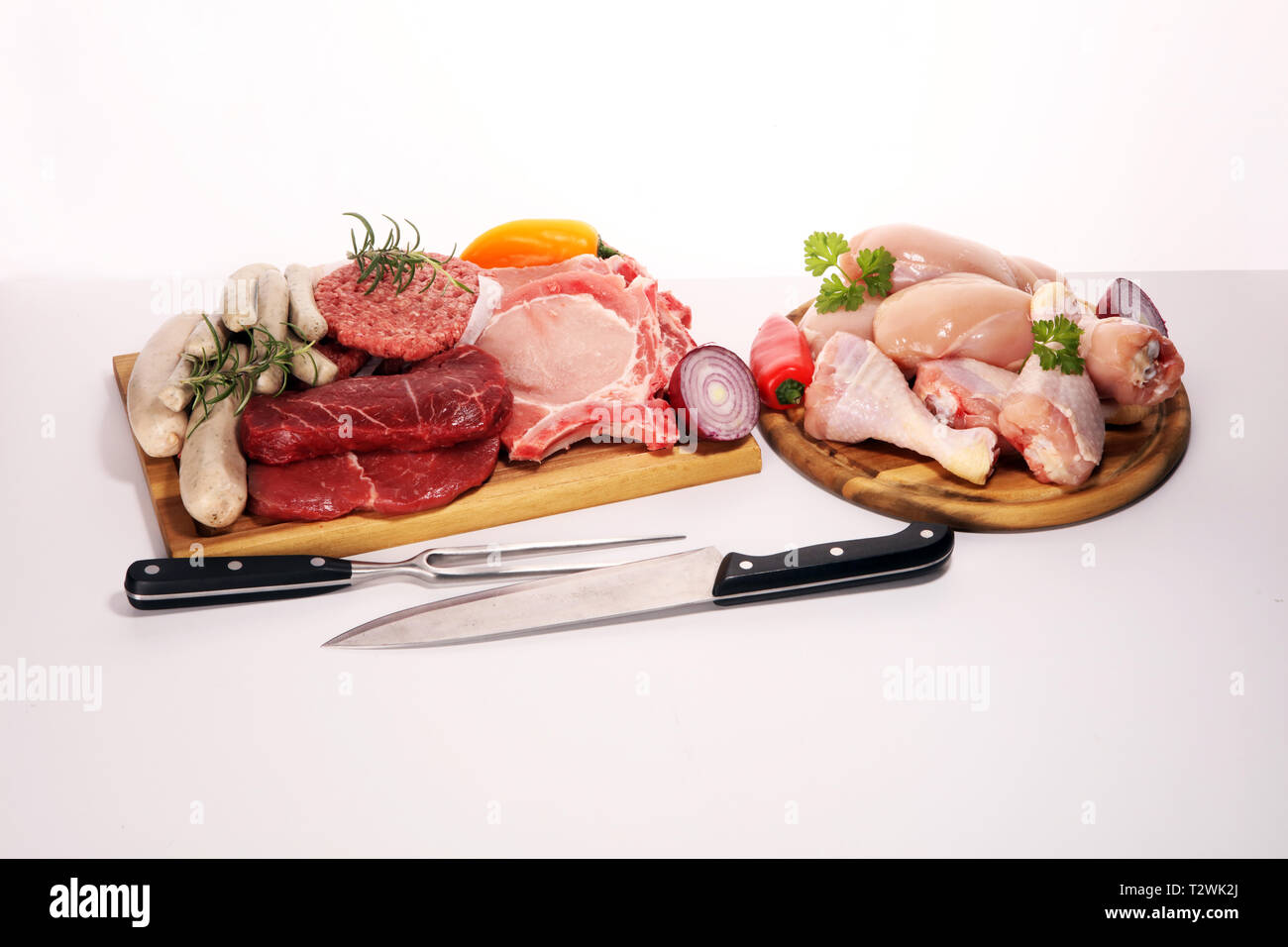 raw meat. Different types of raw pork meat, chicken and beef with ...