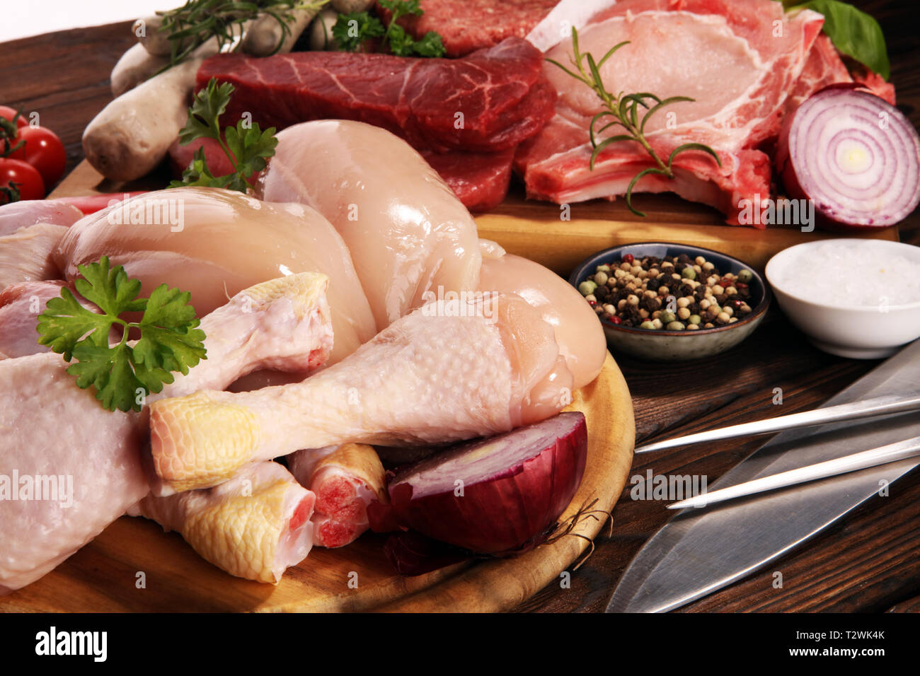 raw meat. Different types of raw pork meat, chicken and beef with ...