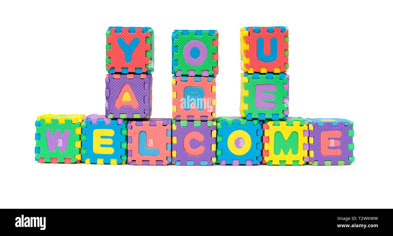 YOU ARE WELCOME shaped by alphabet jigsaw puzzle on white Stock Photo ...