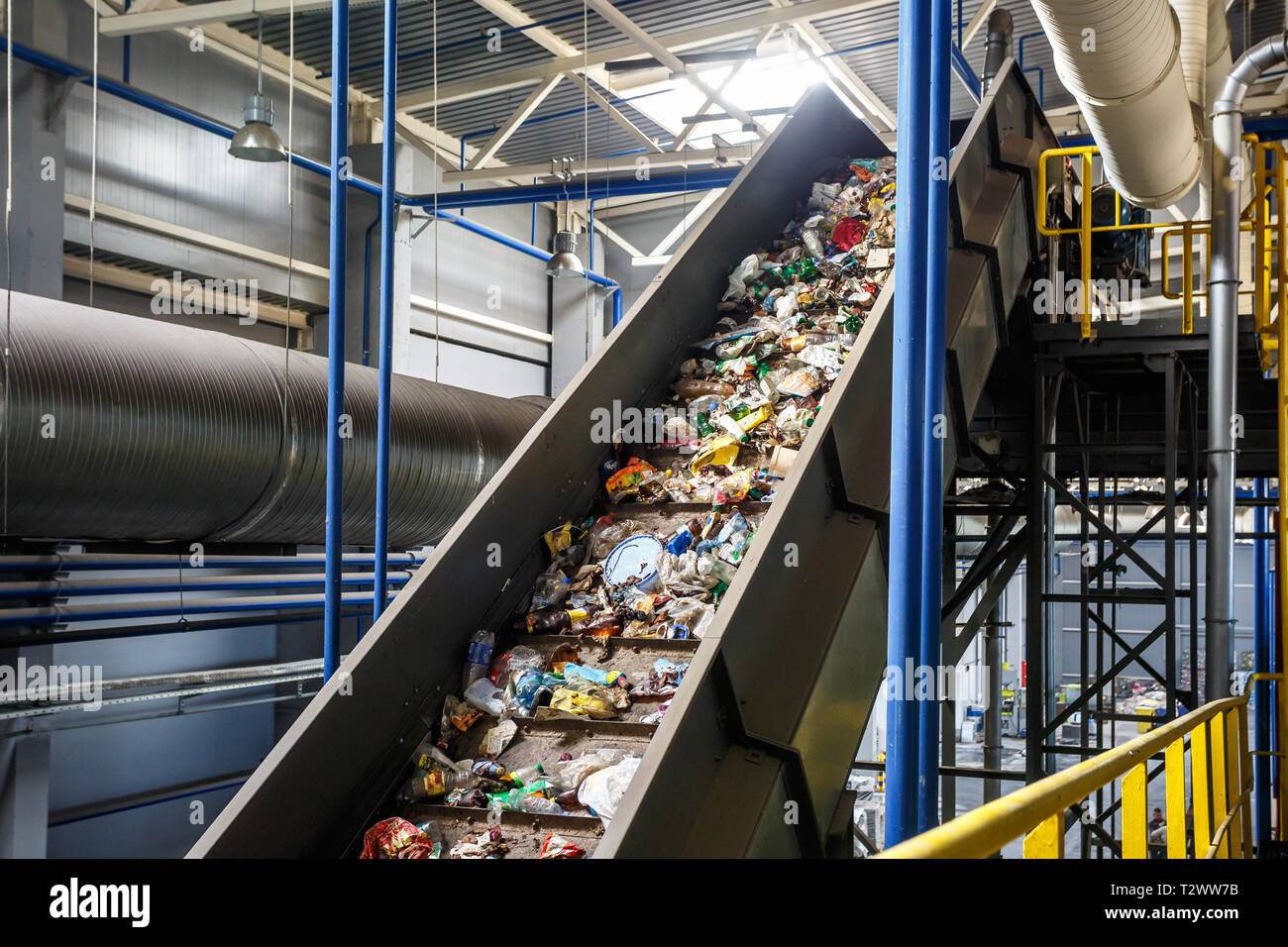 moving conveyor transporter on Modern waste recycling processing plant ...