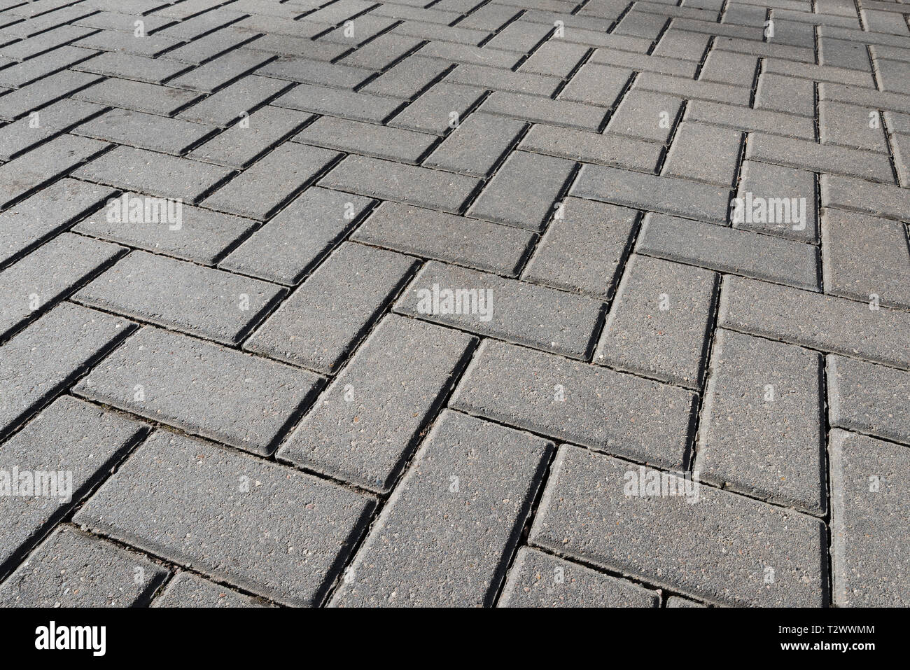 Texture of road tiles with herringbone pattern Stock Photo - Alamy