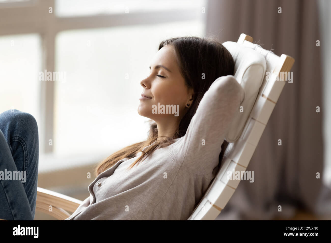 Balance on chair hi-res stock photography and images - Alamy