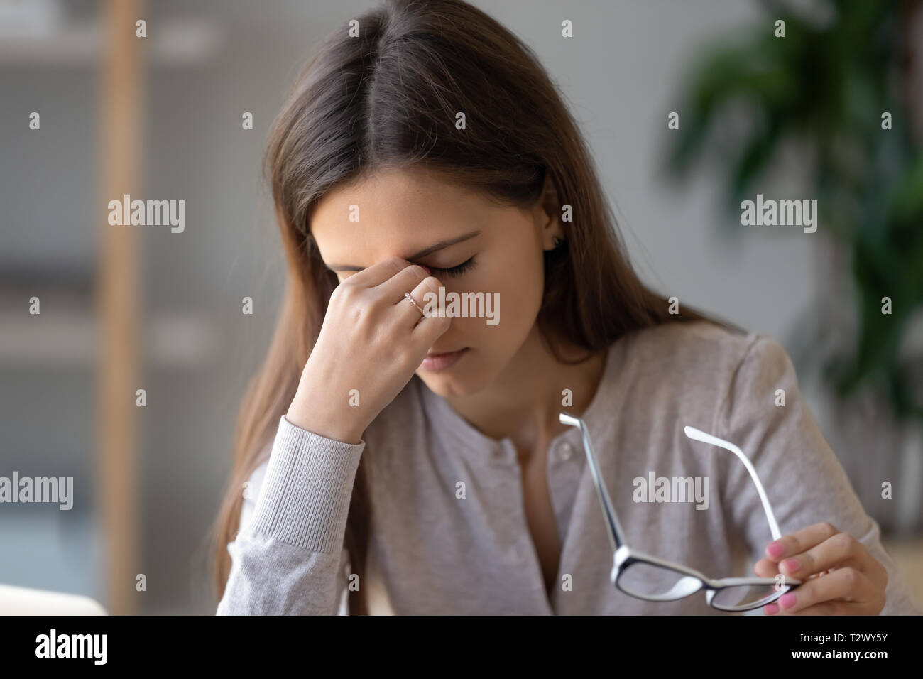 Taking off eyeglasses hi-res stock photography and images - Alamy