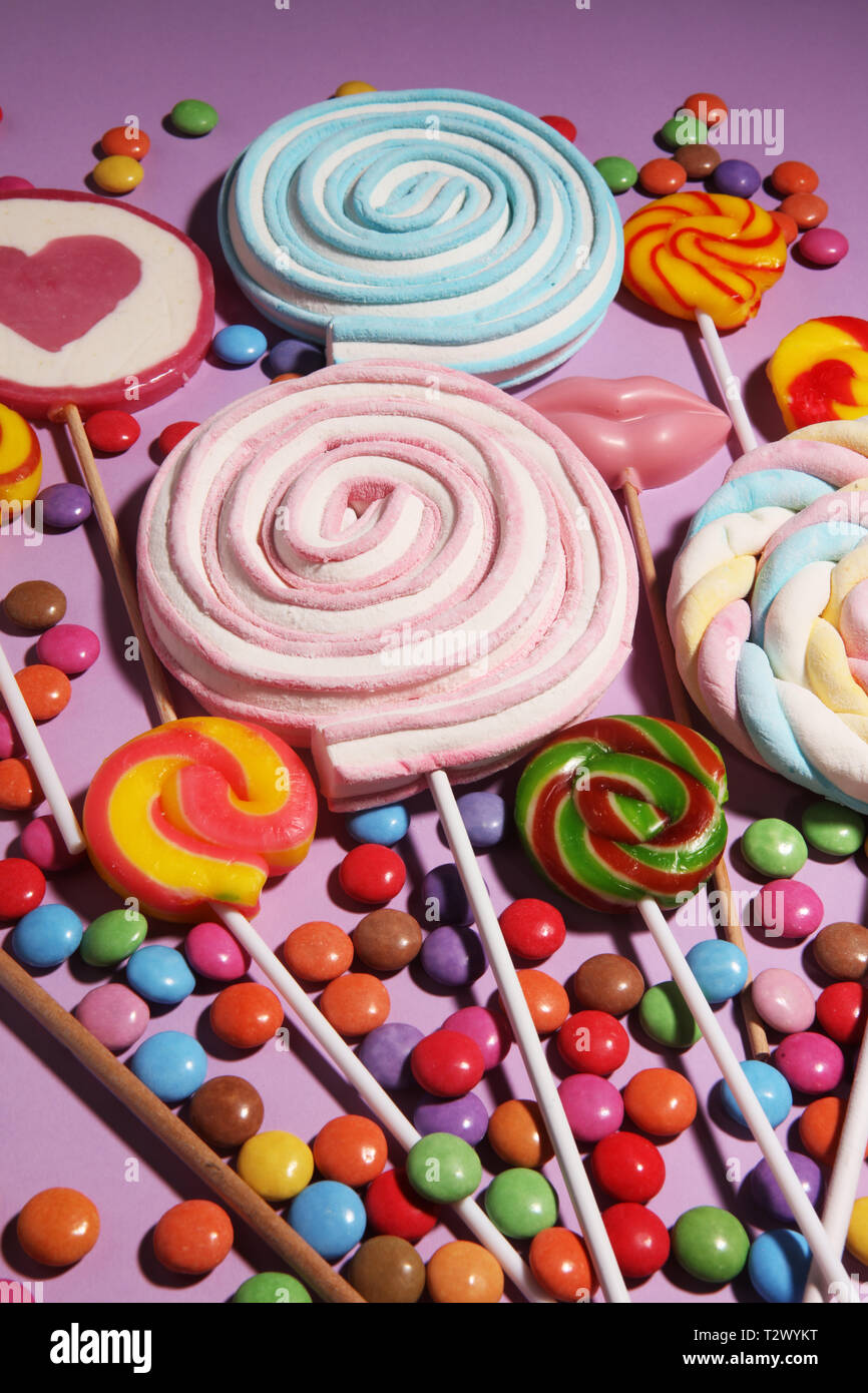 lollipop candies with jelly and sugar. colorful array of different ...
