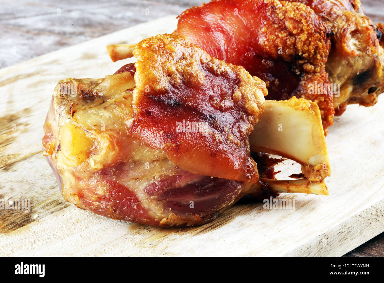 Roasted pork knuckle. Ham and bacon are popular foods in the west ...
