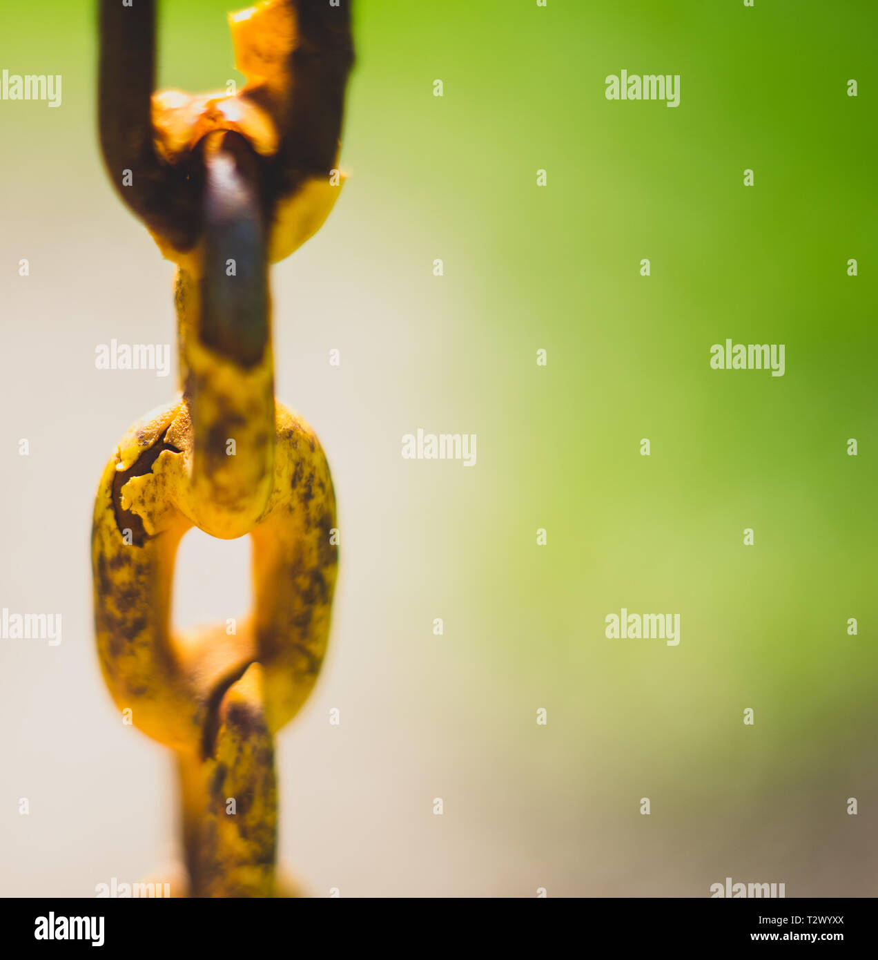 Rusty swing chain link macro photograph Stock Photo - Alamy
