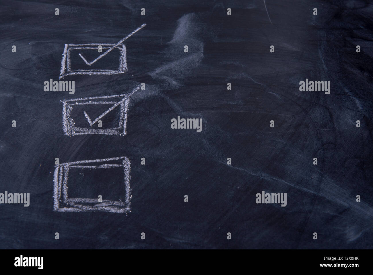 blackboard with check boxes checked and unchecked Stock Photo - Alamy